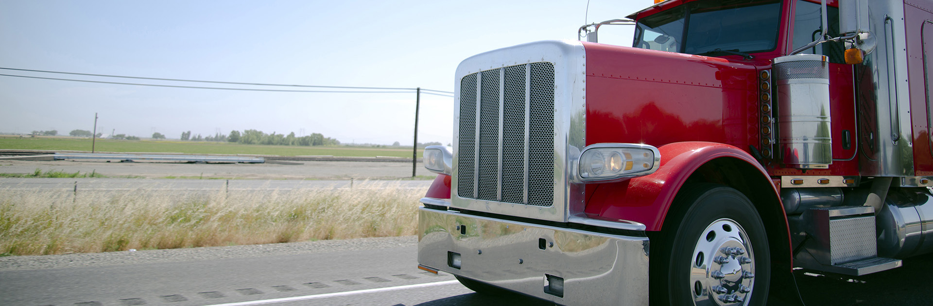 Gorgeous bright red shiny big rig semi truck with chrome parts a - SRX ...